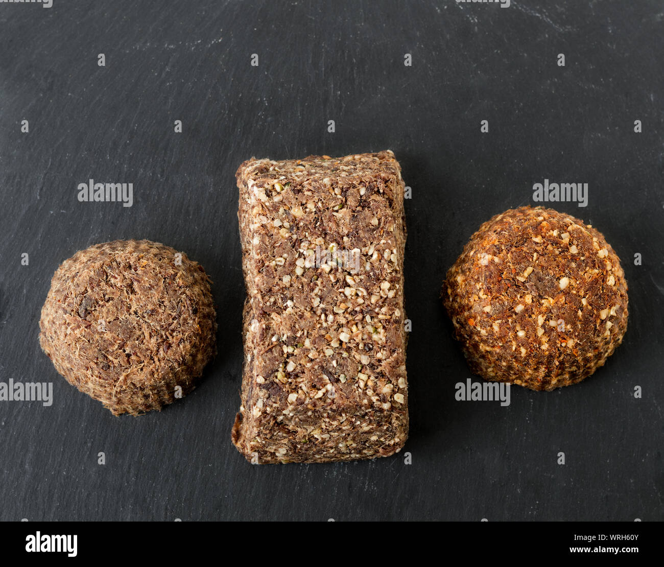 Top view of three bars of homemade beef meat and liver pemmican, plain ...