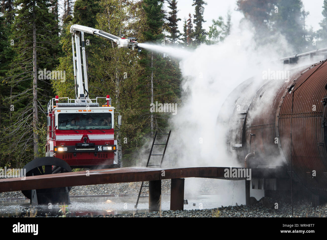 U.S. Air Force fire protection specialists with the 673d Civil Engineer ...