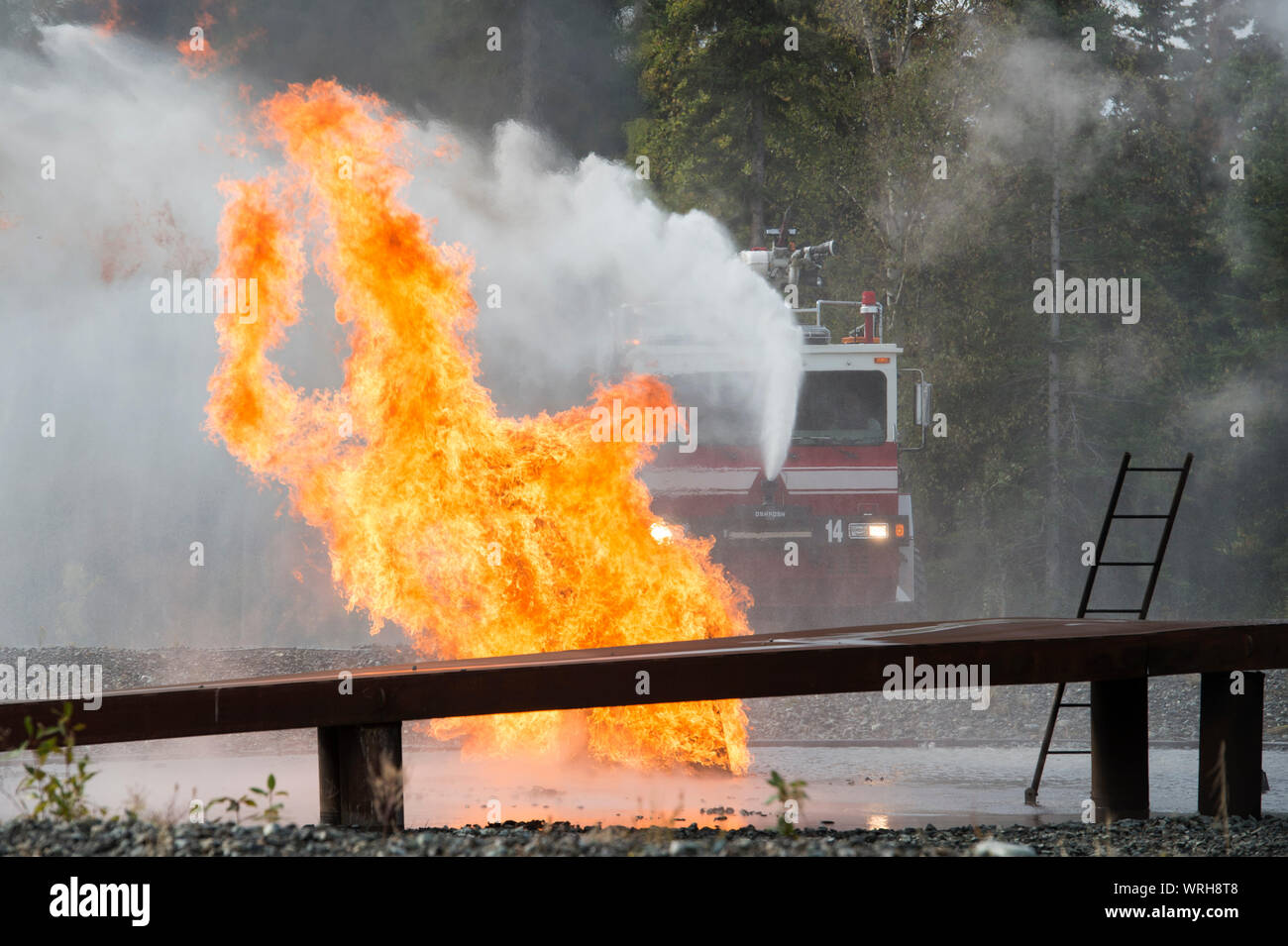 U.S. Air Force fire protection specialists with the 673d Civil Engineer ...