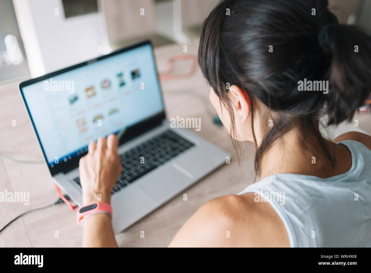 Woman typing computer back view hi-res stock photography and images - Alamy
