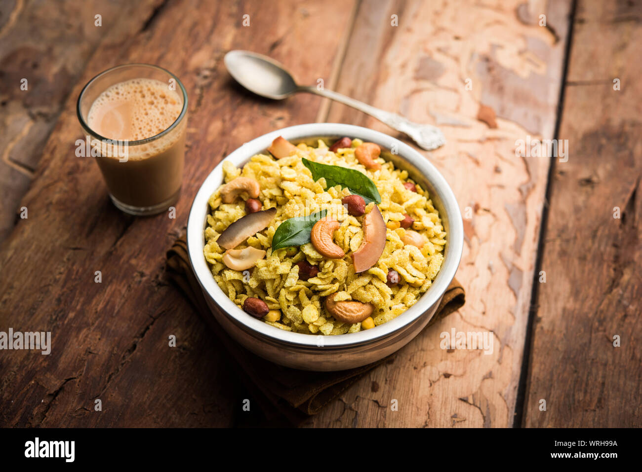 Jada Poha Namkeen Chivda / Thick Pohe Chiwda is a jar snack with a mix ...