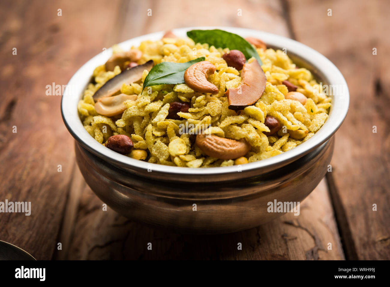 Jada Poha Namkeen Chivda / Thick Pohe Chiwda is a jar snack with a mix ...