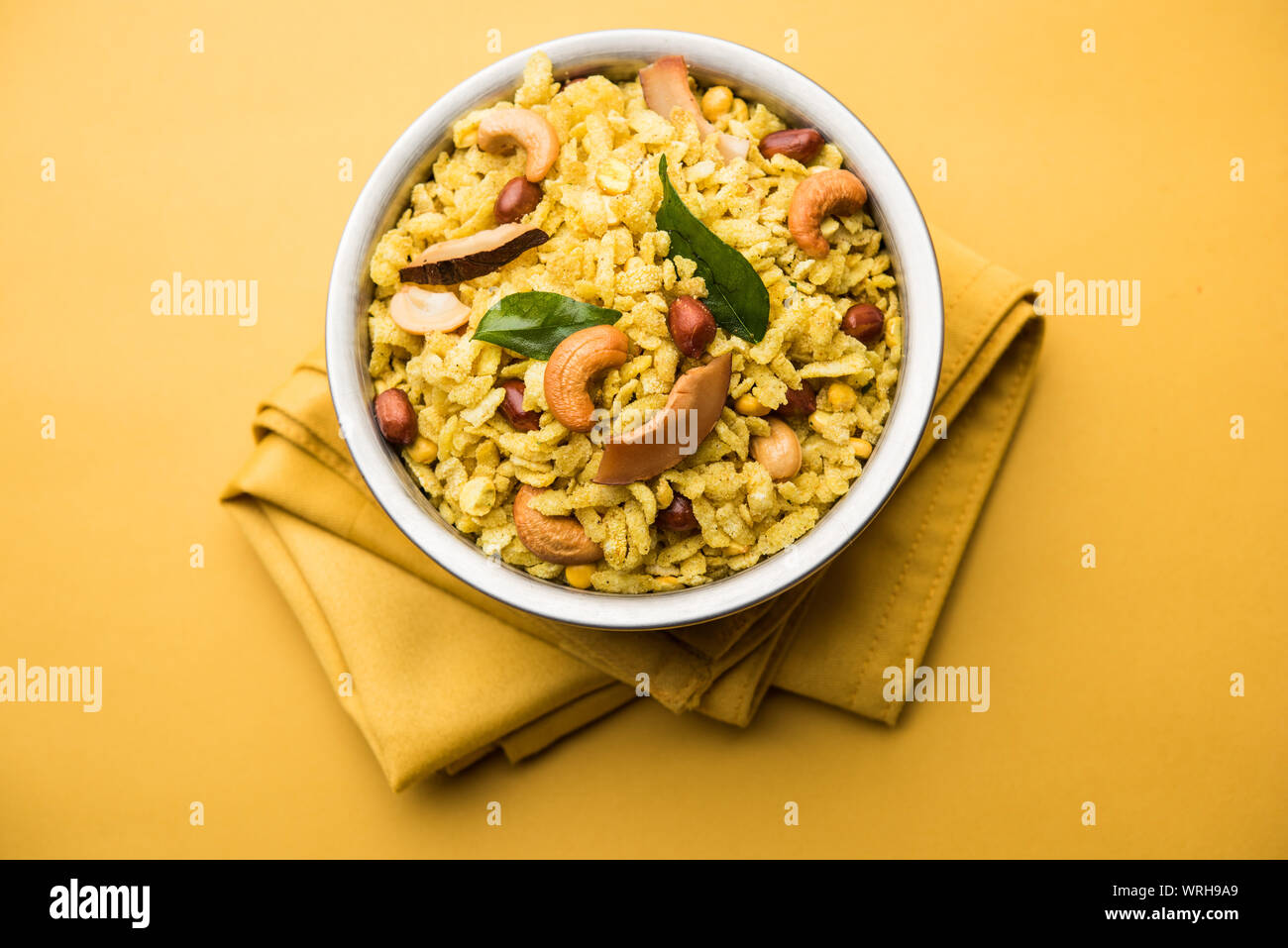 Jada Poha Namkeen Chivda / Thick Pohe Chiwda is a jar snack with a mix ...