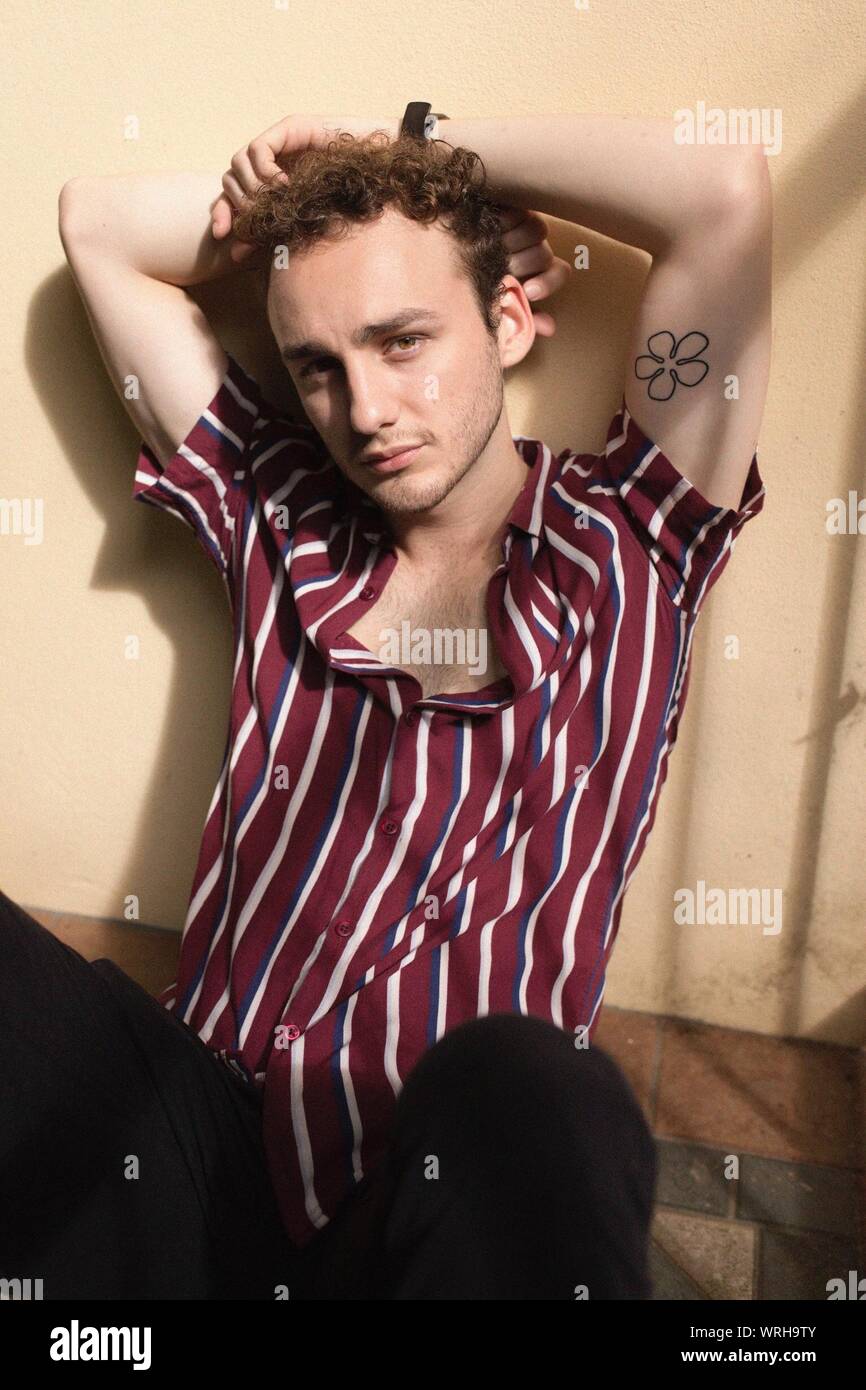 Man resting wall hi-res stock photography and images - Alamy