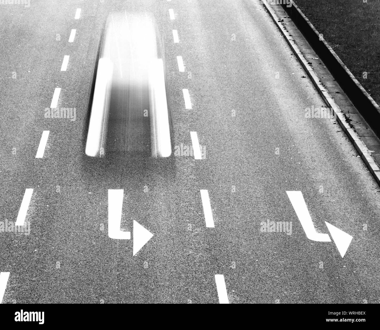 Direction Signs On Road Surface Black and White Stock Photos & Images ...
