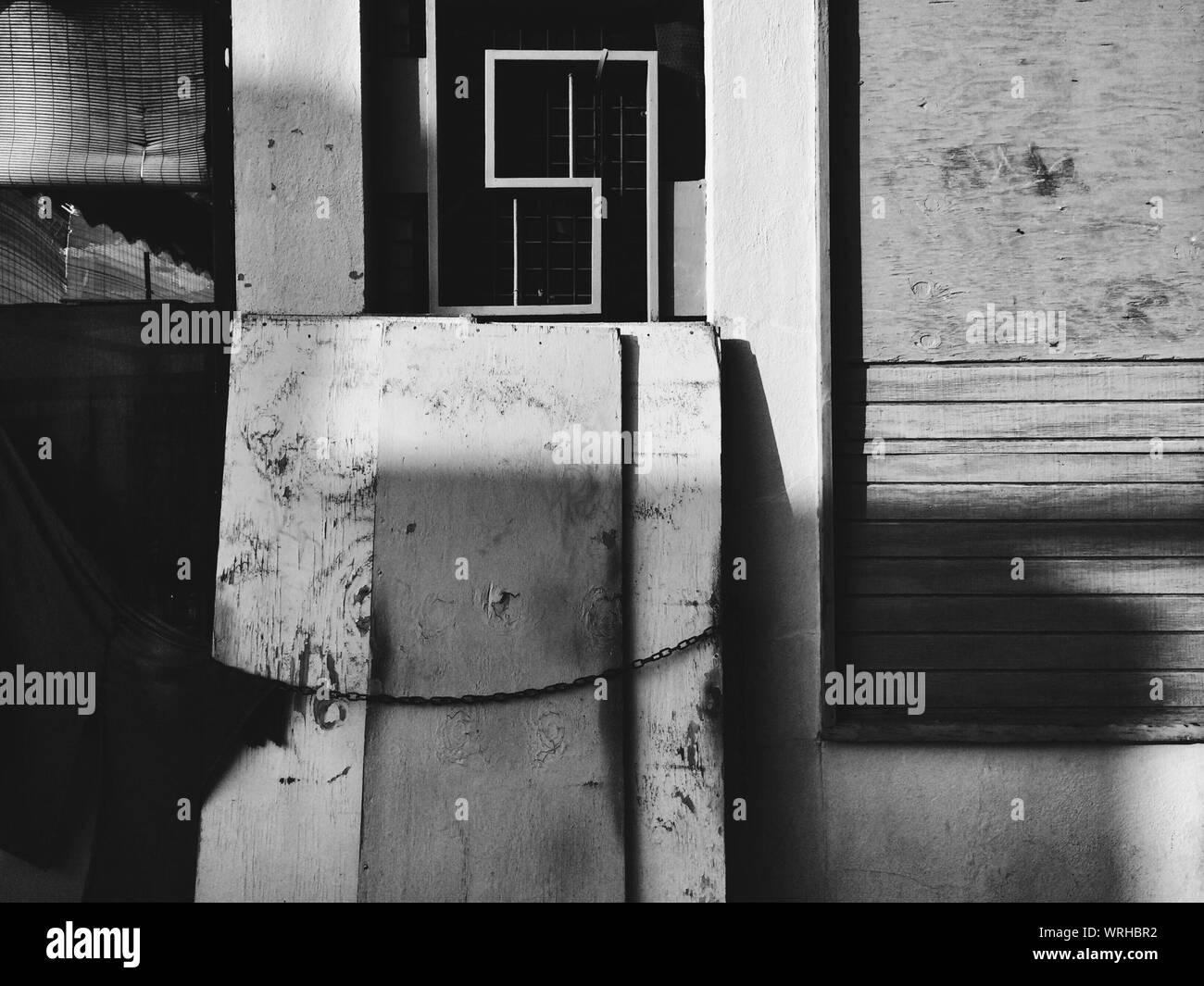 Wooden Planks Leaning On Building Stock Photo - Alamy