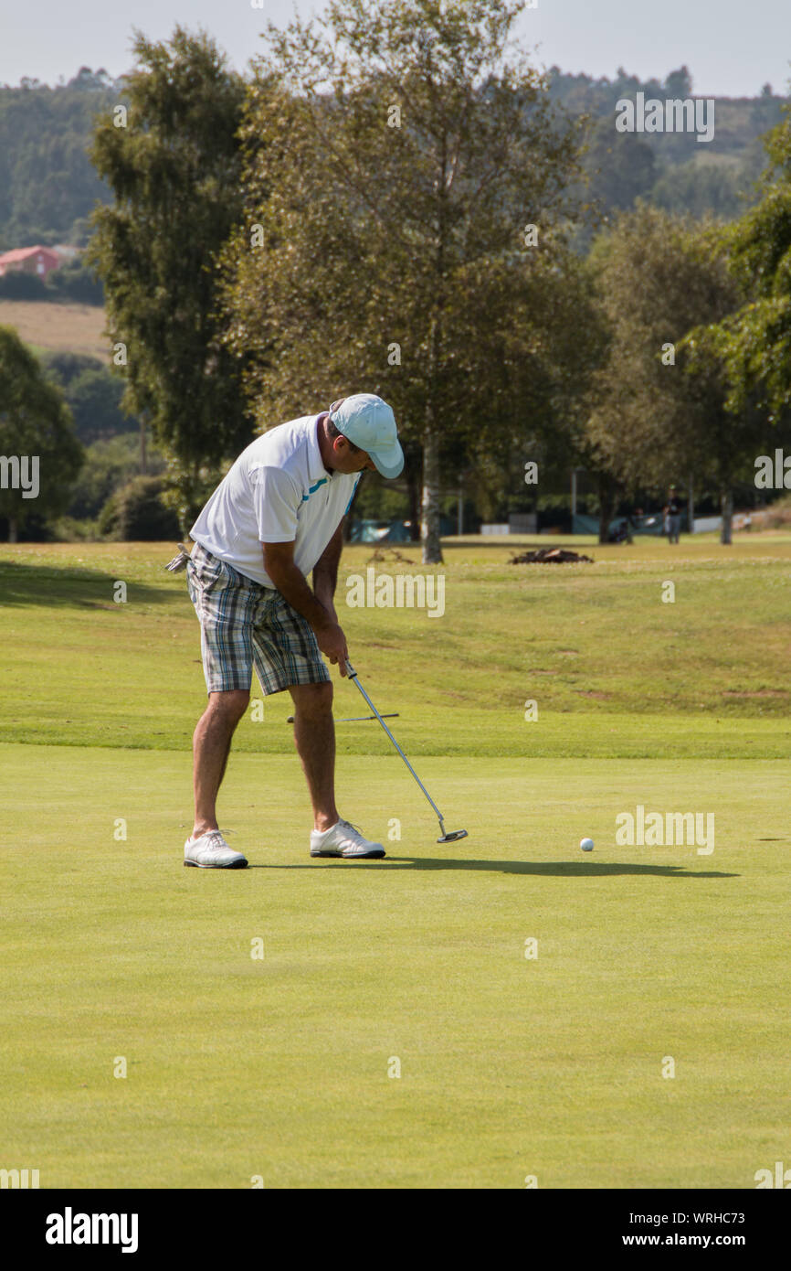 Golfers at play hi-res stock photography and images - Alamy