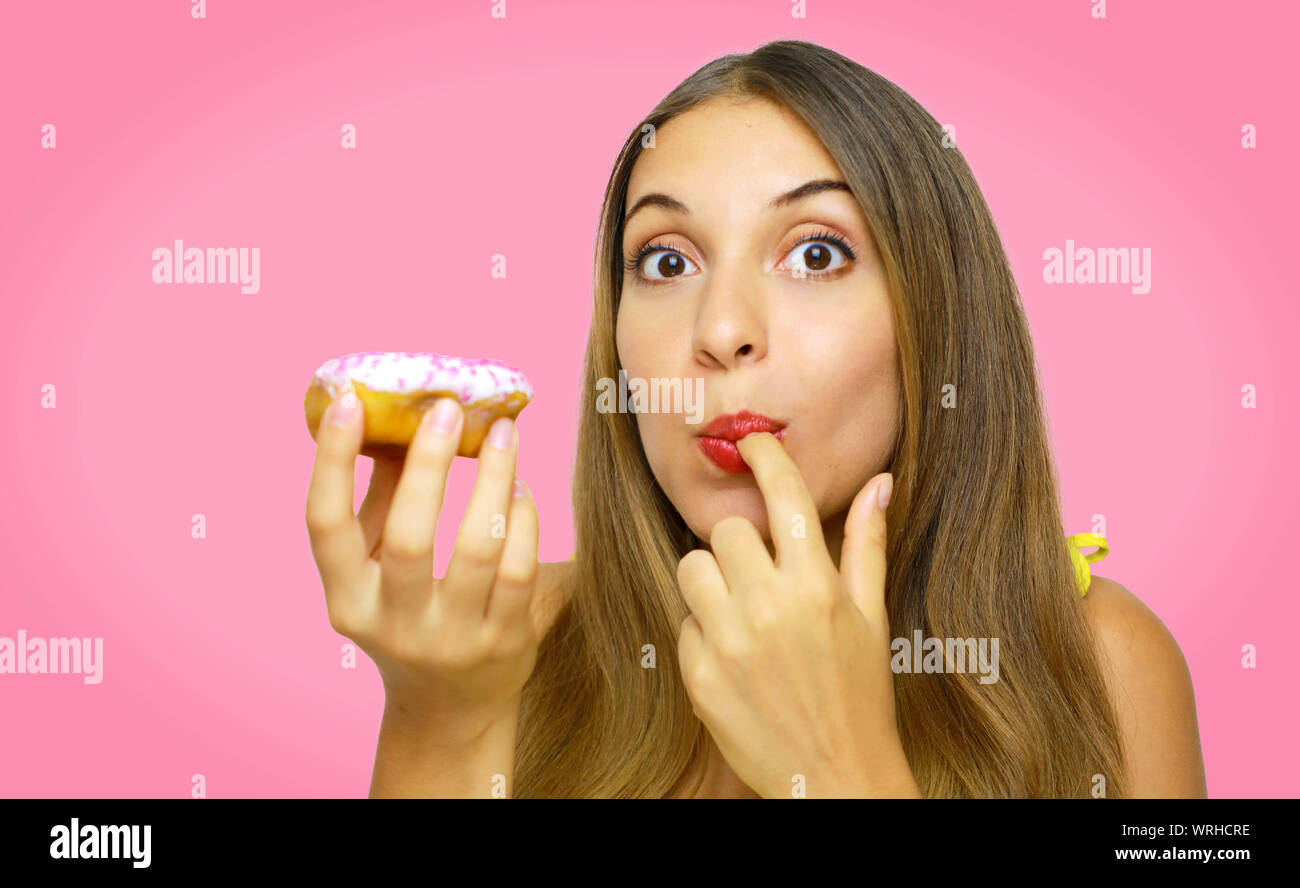Women grabbing donut hi-res stock photography and images - Alamy