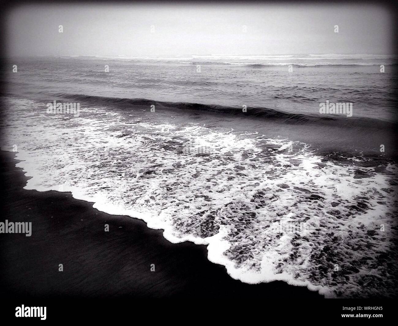 View Of Surf On Beach Stock Photo - Alamy