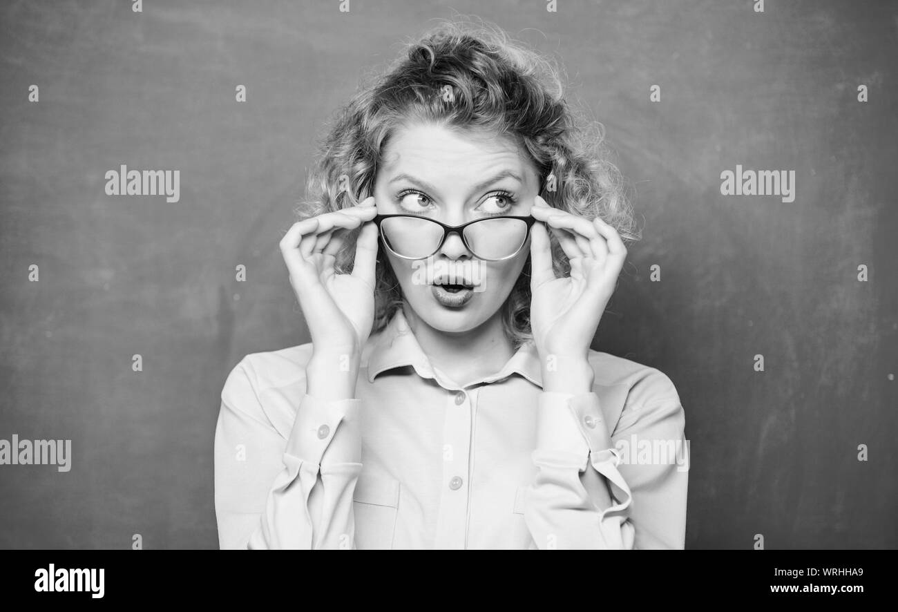 new school year. Girl prepare for exam. surprised student in glasses at ...