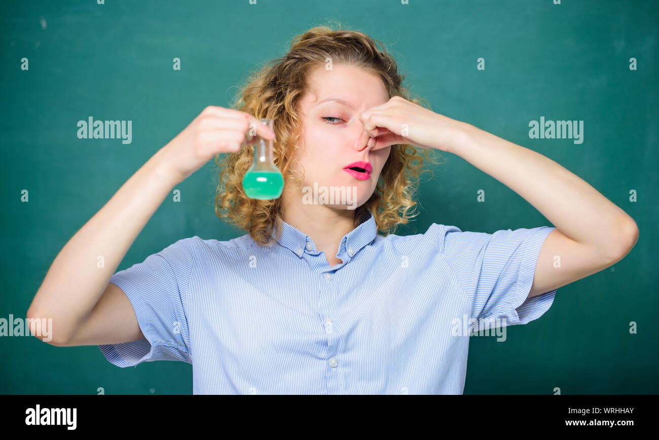 Chemical liquid smelling really bad. Disgusting experiment. Girl ...