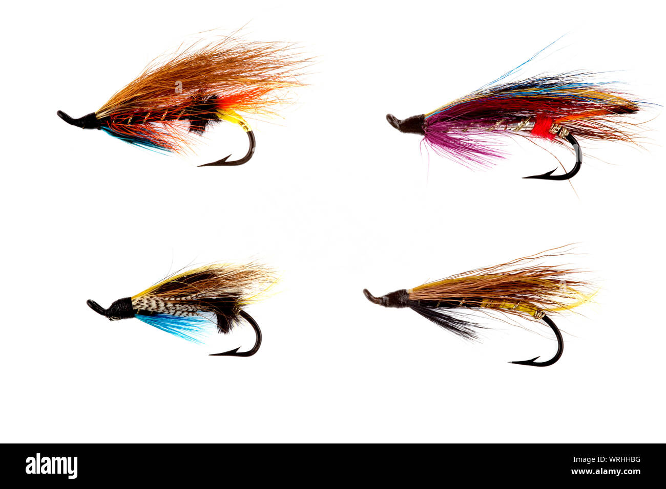 A selection of traditional salmon fishing flies isolated on white ...