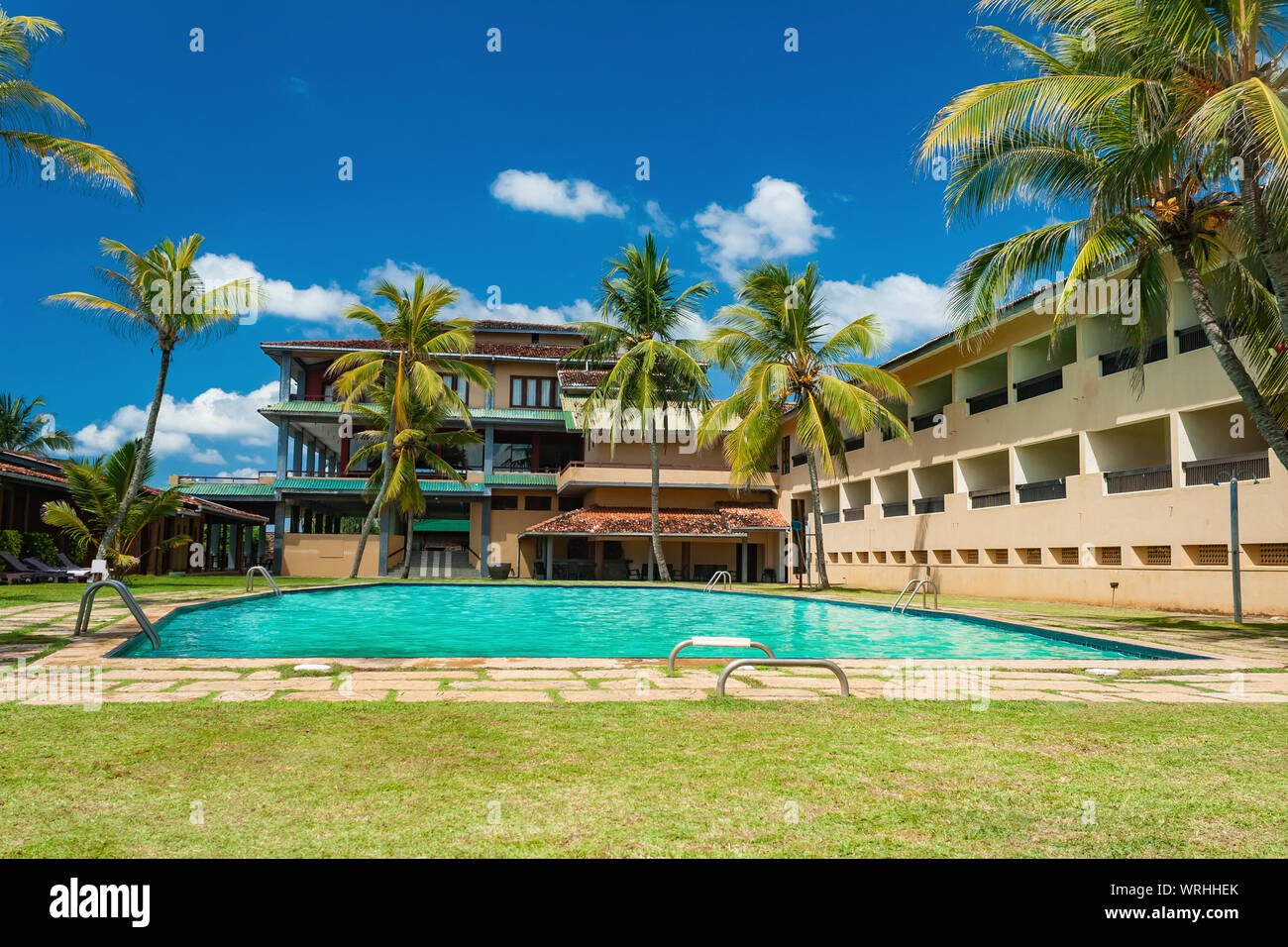 Tropical swimming pool coconut tree hi-res stock photography and images ...