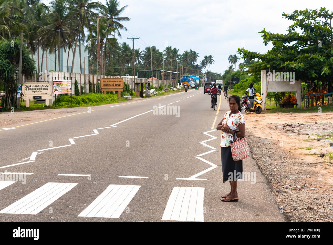 Old lady crossing road hi-res stock photography and images - Alamy