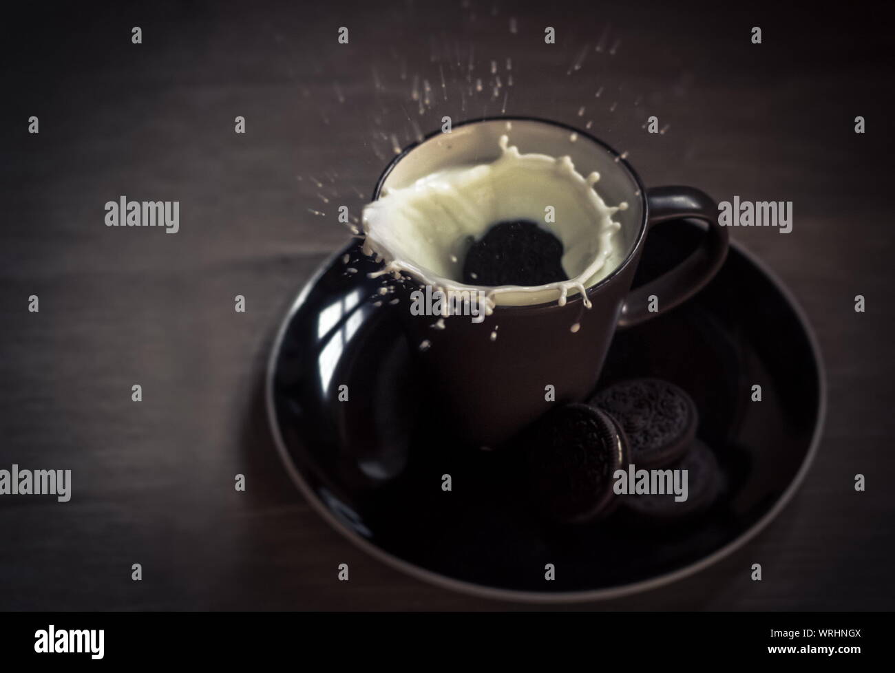Milk splashing cup hi-res stock photography and images - Alamy