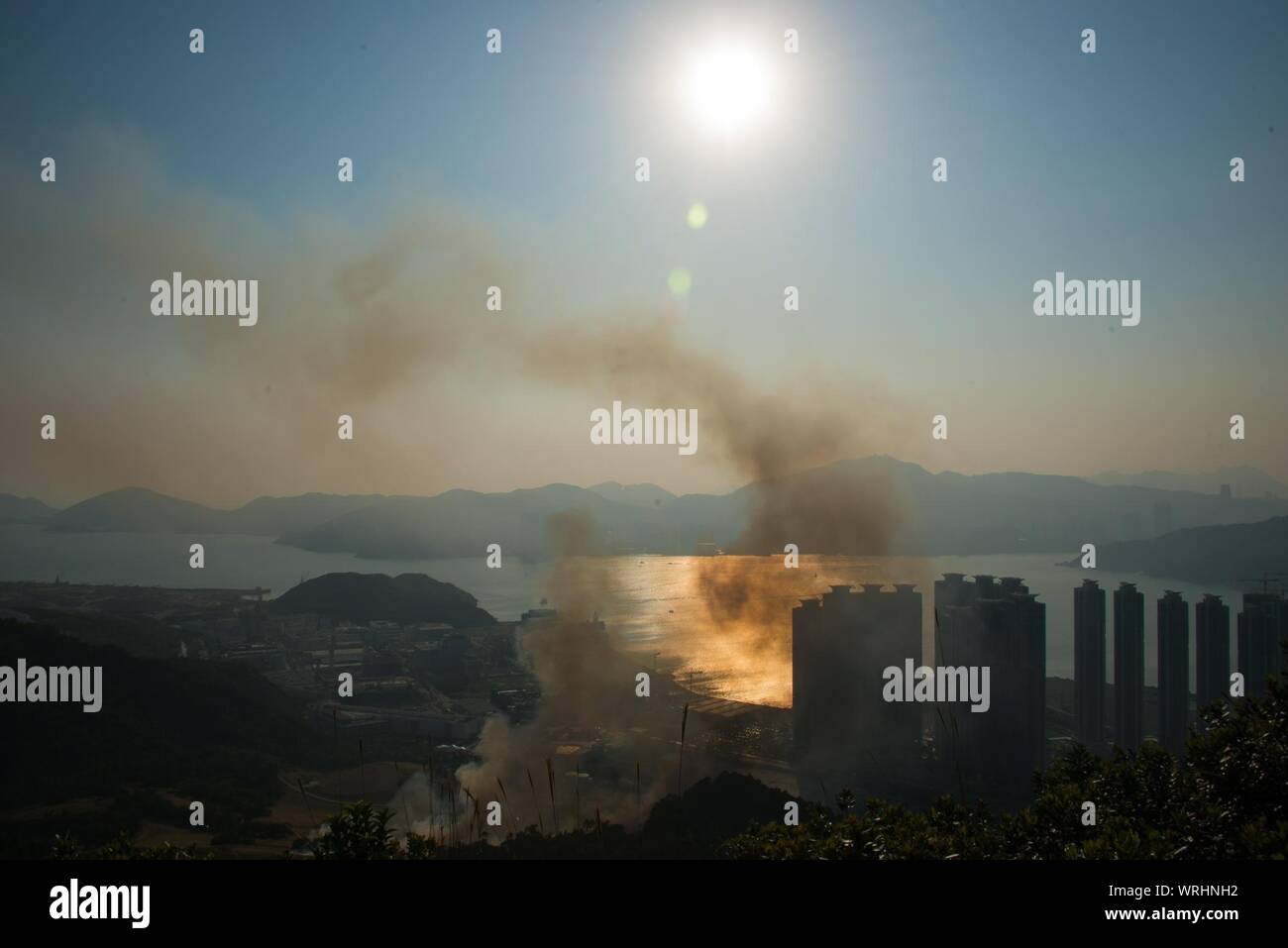 Sky smoke buildings buildings smoke hi-res stock photography and images ...