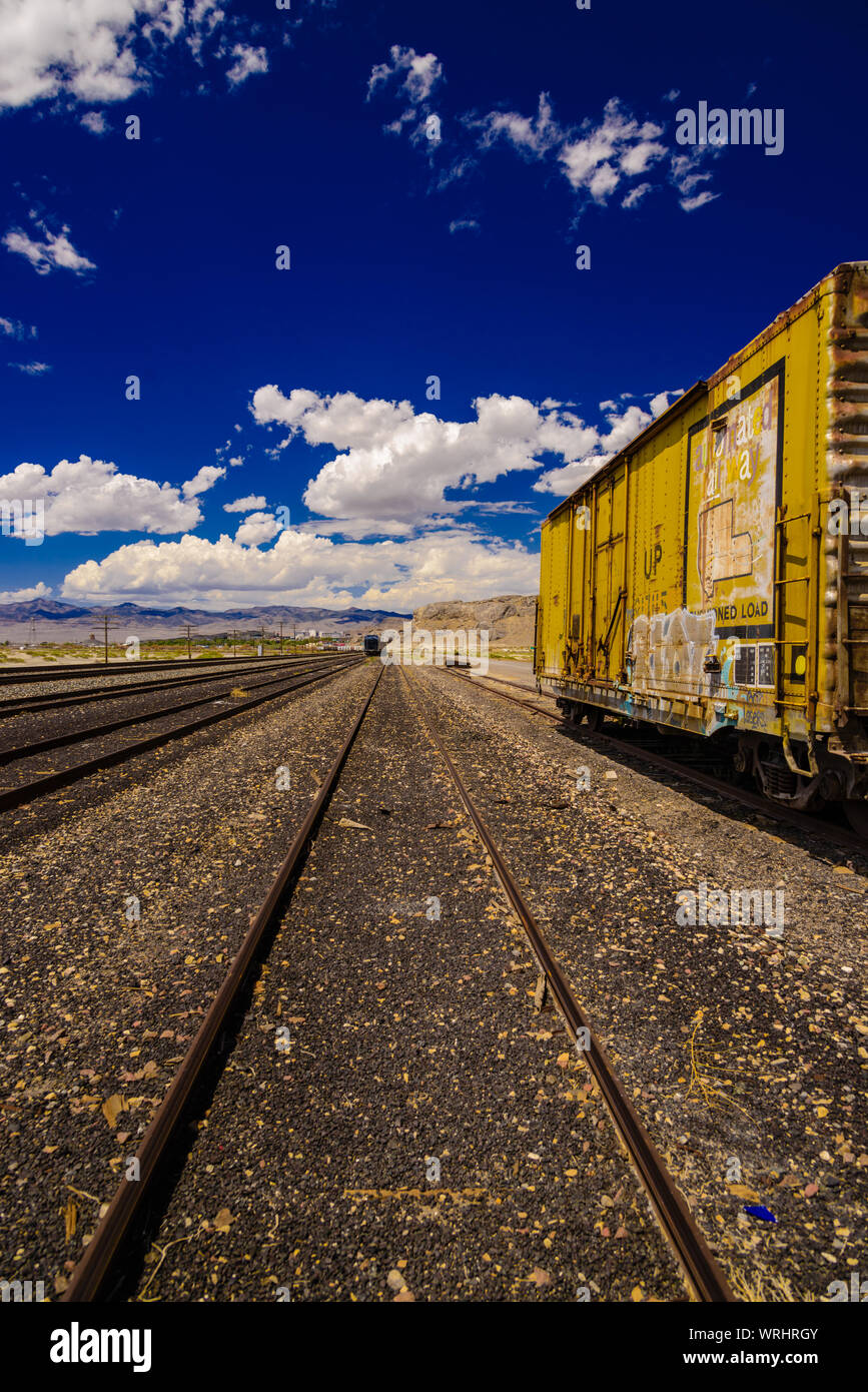 Old rusted freight train on railroad tracks in Wendover, Utah, USA ...