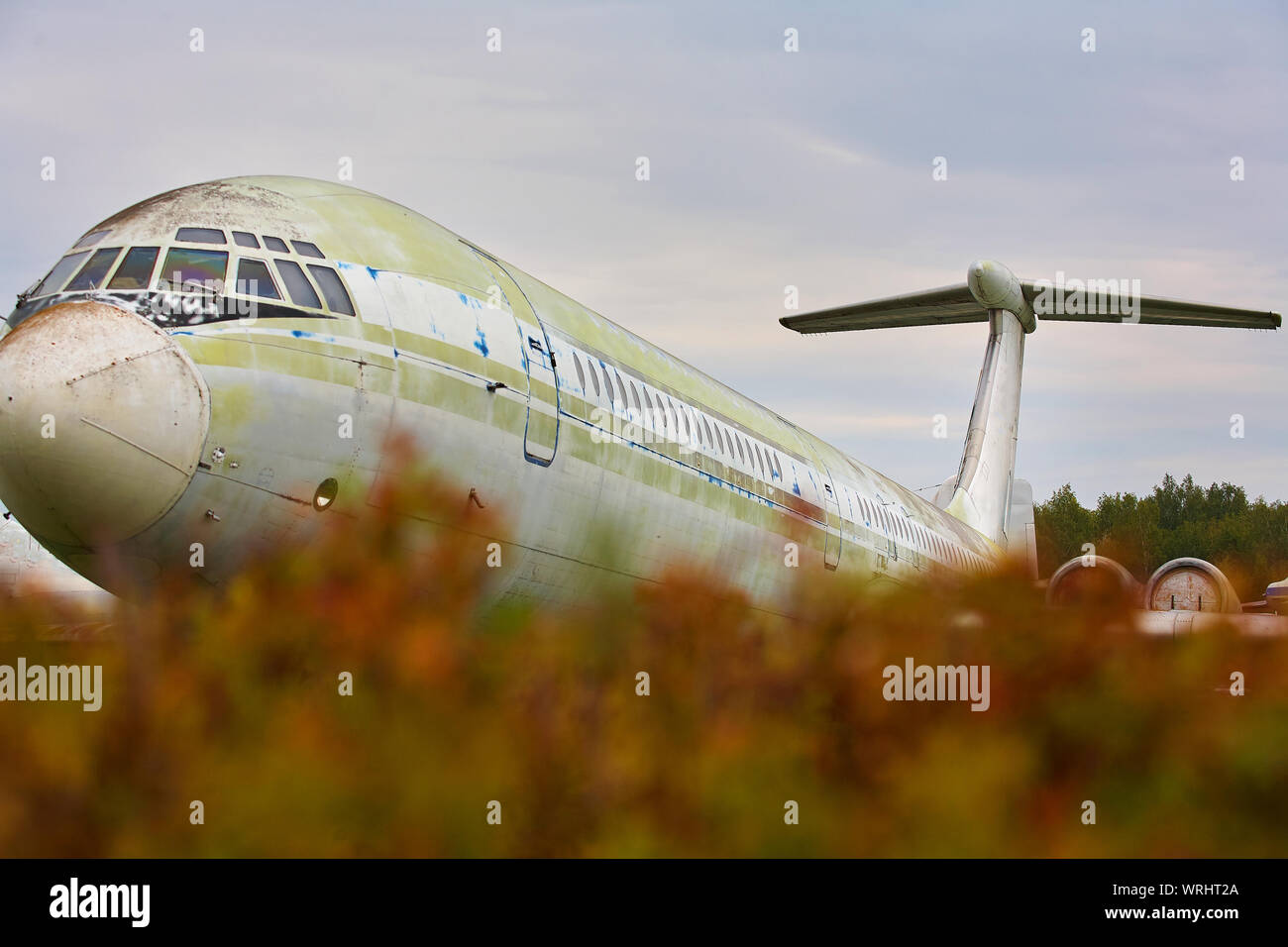 Old, shabby military transport, cargo plane close-up Stock Photo - Alamy