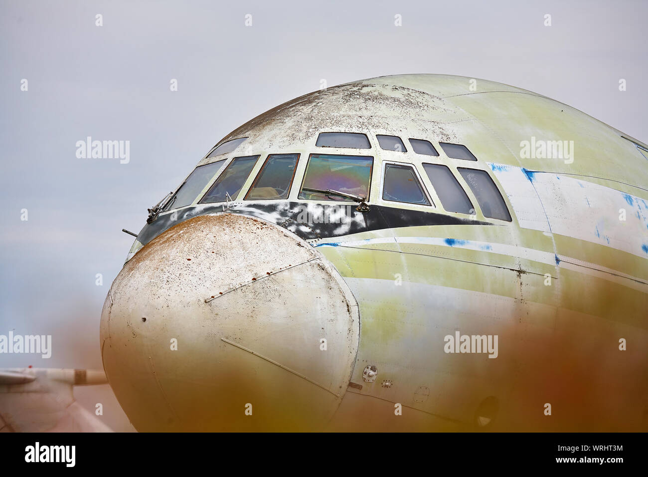 Old, shabby military transport, cargo plane close-up Stock Photo - Alamy