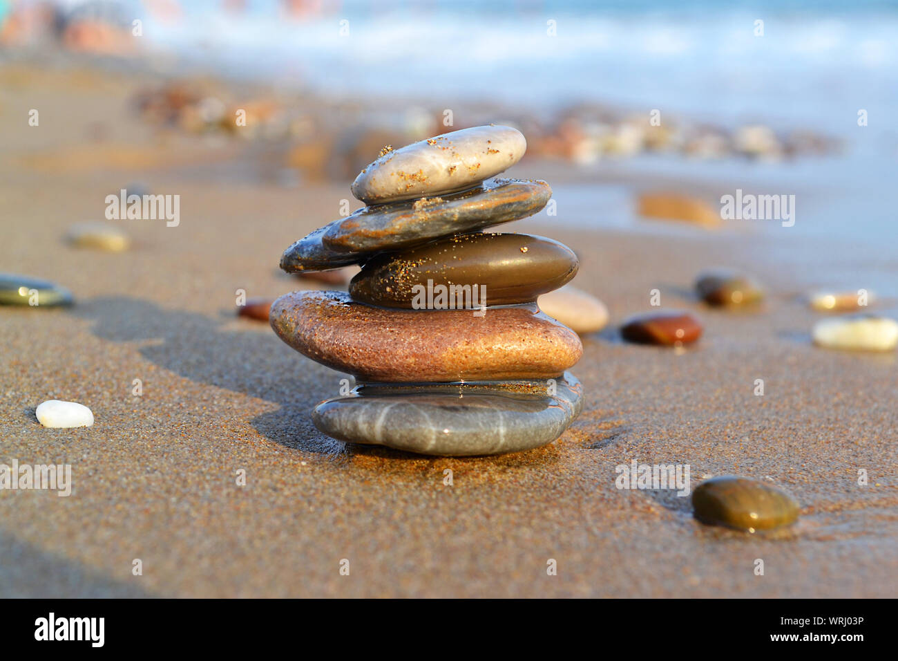 Close-up of zen standing stones "tower" made of different colours ...