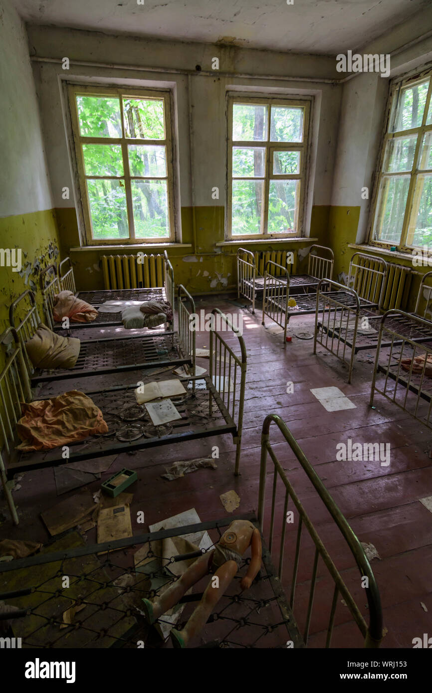 Chernobyl (Chornobyl): abandoned kindergarten of Kopachi, beds, dolls ...