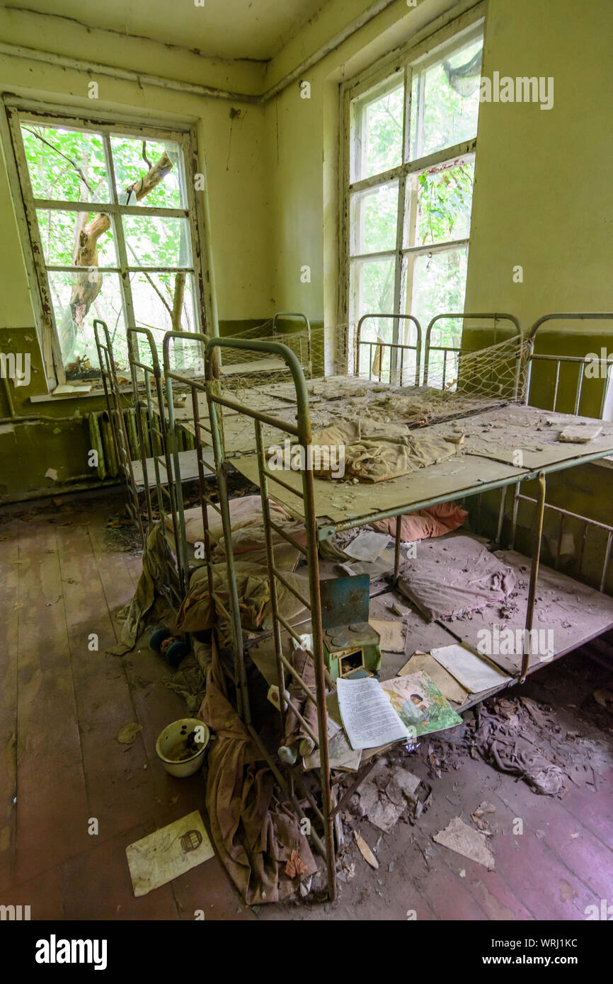 Chernobyl (Chornobyl): abandoned kindergarten of Kopachi, beds, dolls ...