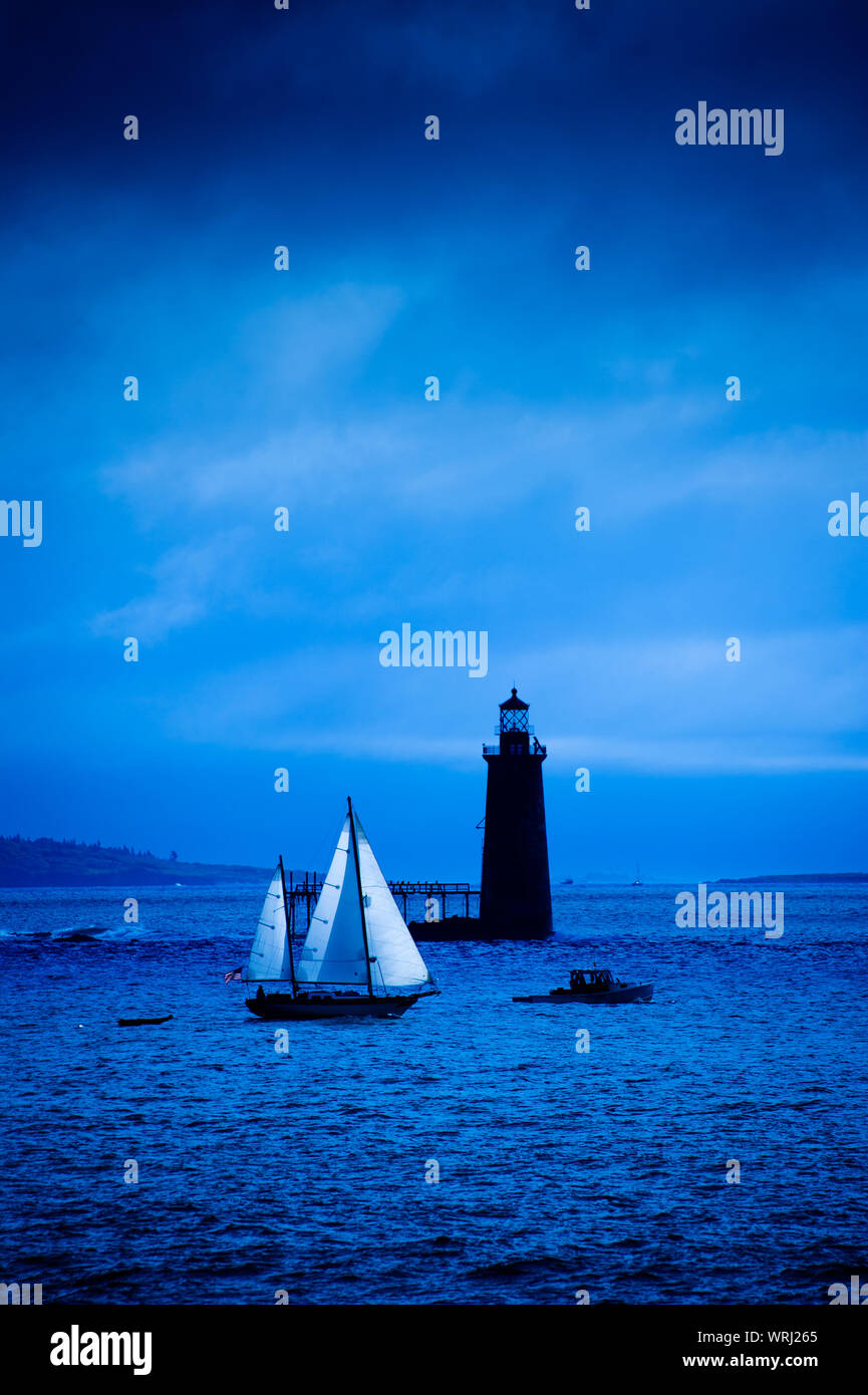 Large sailboat passing by Ram Island Ledge Lighthouse in Portland ...