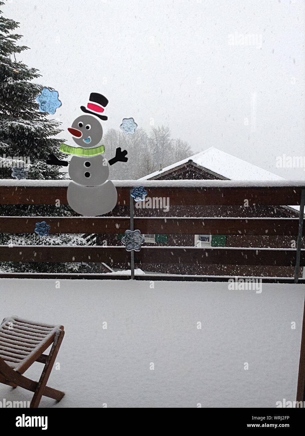 Snowman on chair hi-res stock photography and images - Alamy