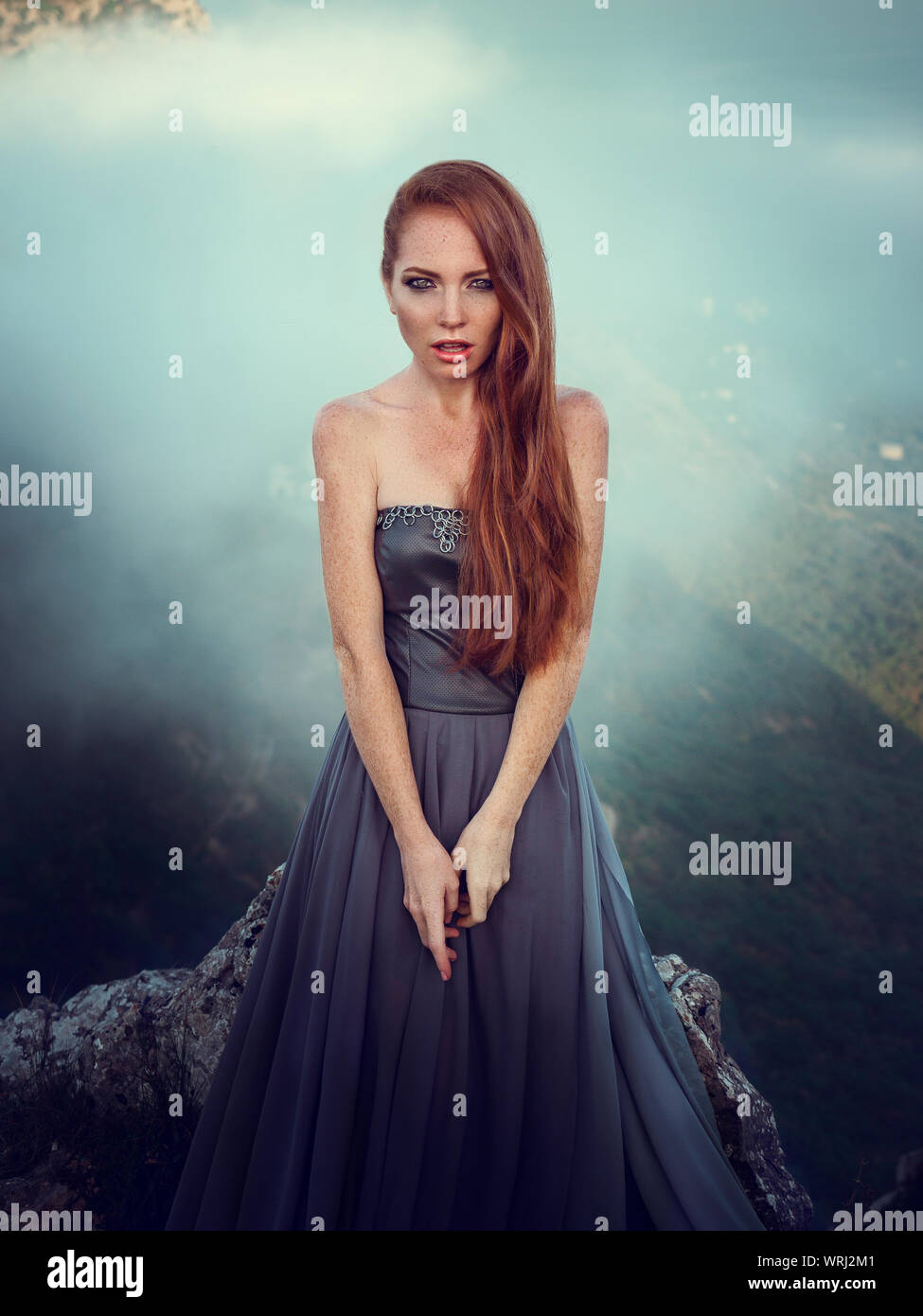 Summer outdoors portrait of beautiful furious scandinavian warrior ...