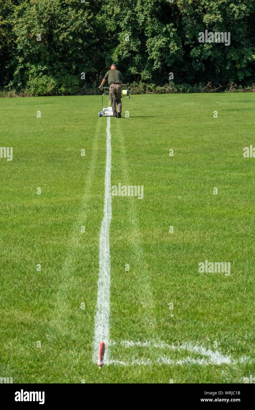 White Llining a sports pitch Stock Photo - Alamy