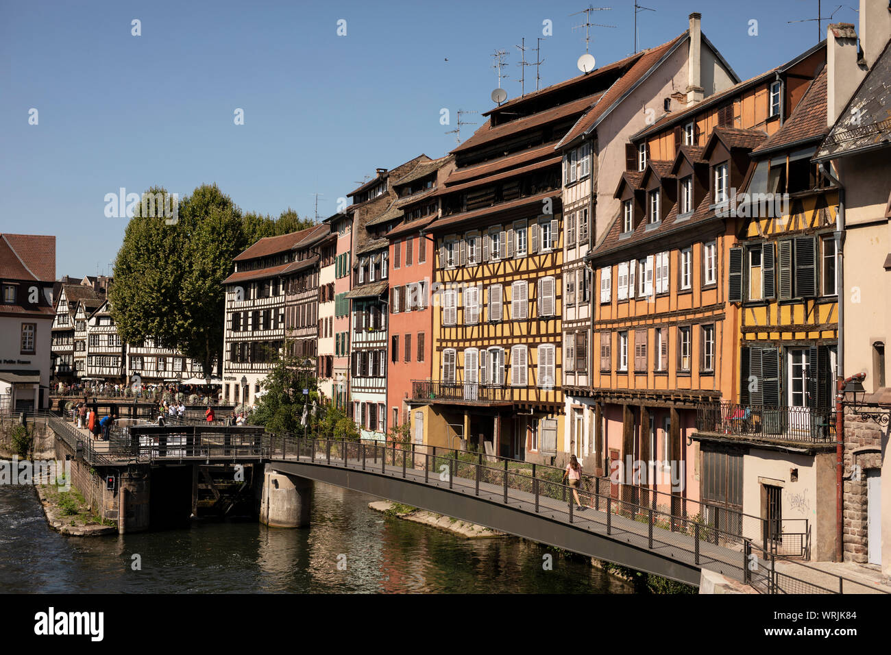 Traditional buildings along the canal in the Petite France quarter of ...