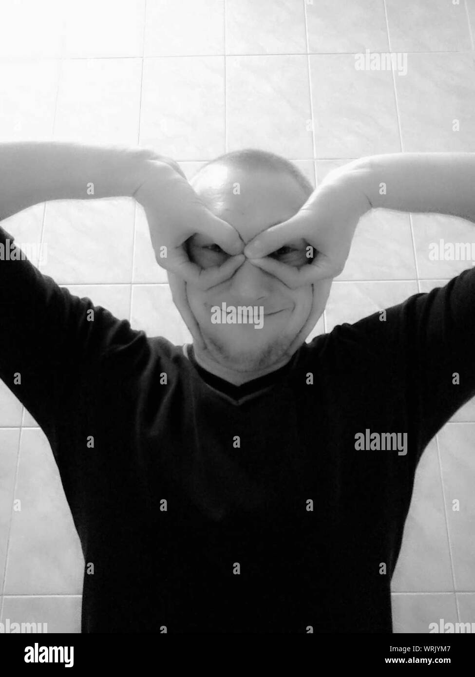 Young man making funny faces hi-res stock photography and images - Alamy