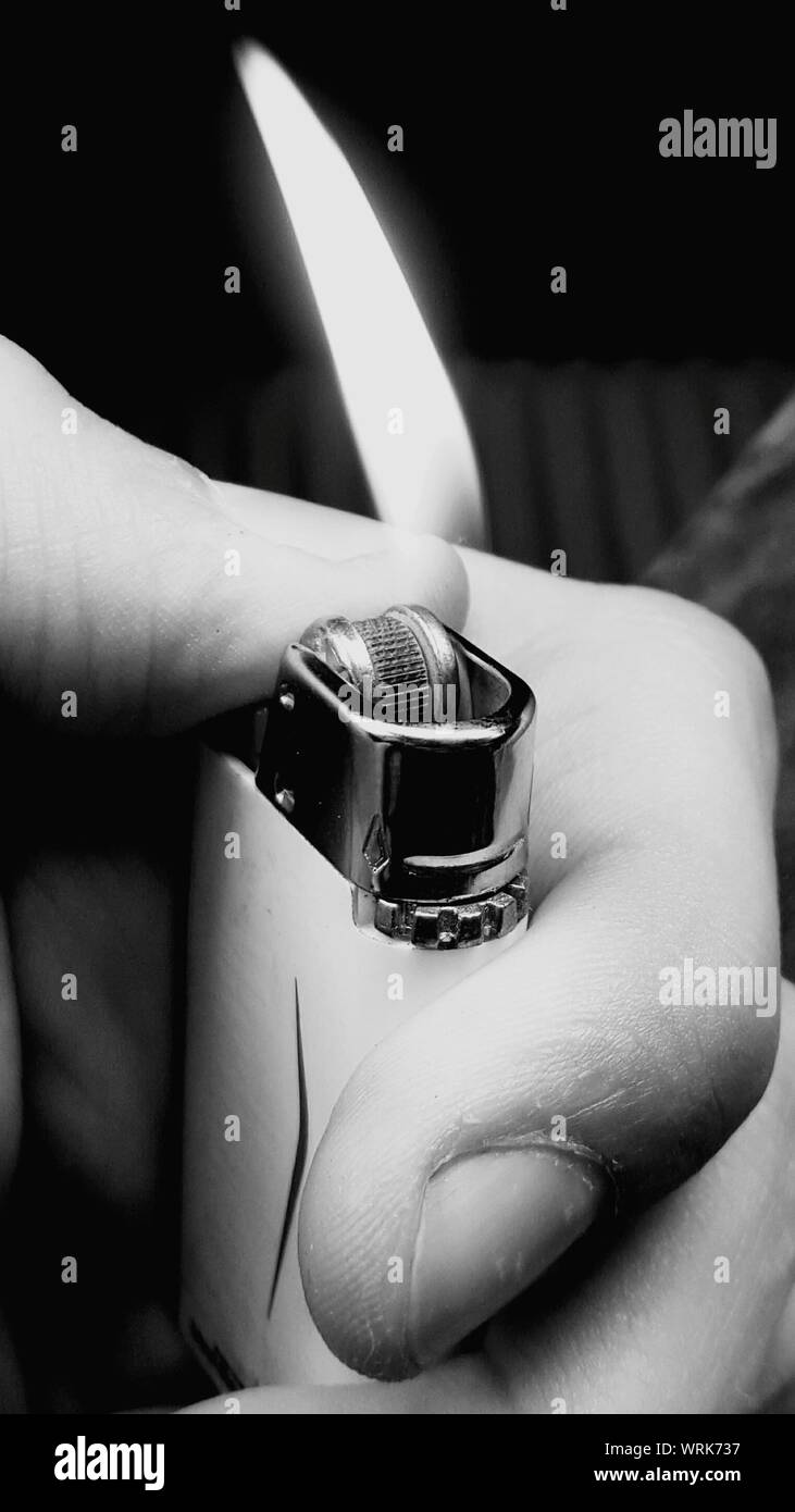 Hand Holding Lighter High Resolution Stock Photography and Images - Alamy