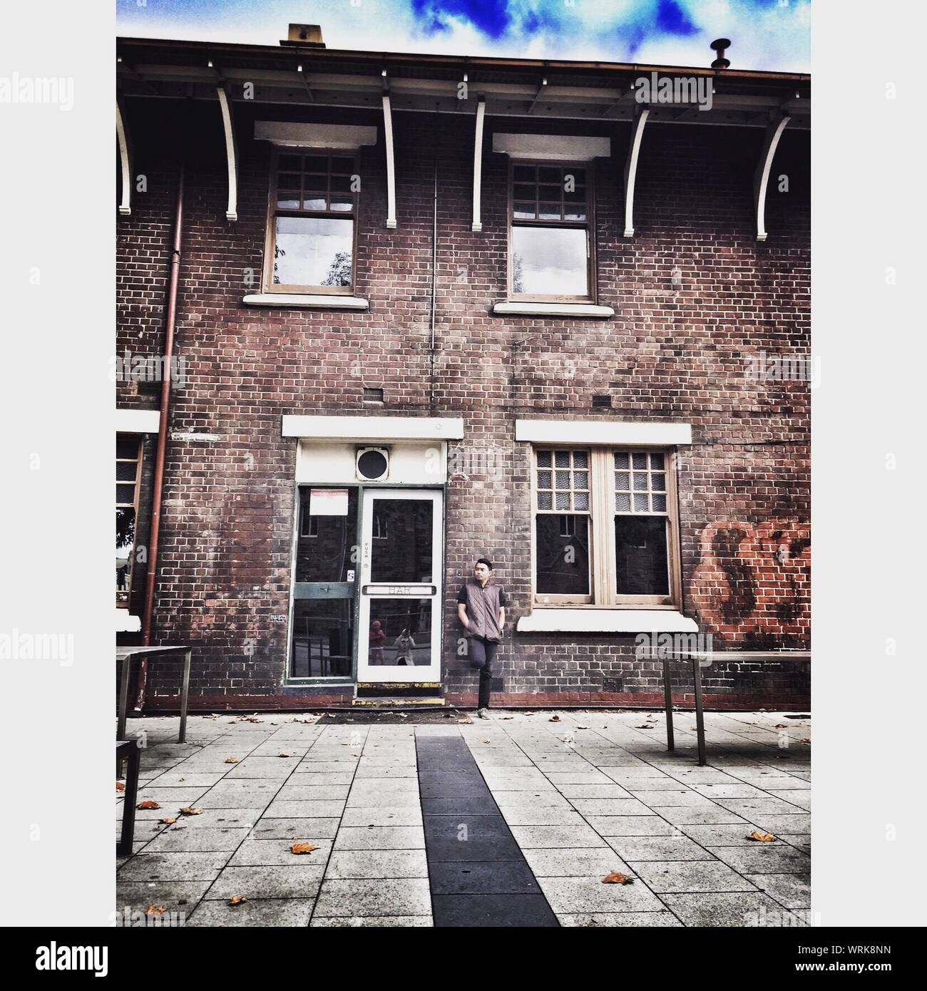 Standing building exterior waiting architecture hi-res stock ...