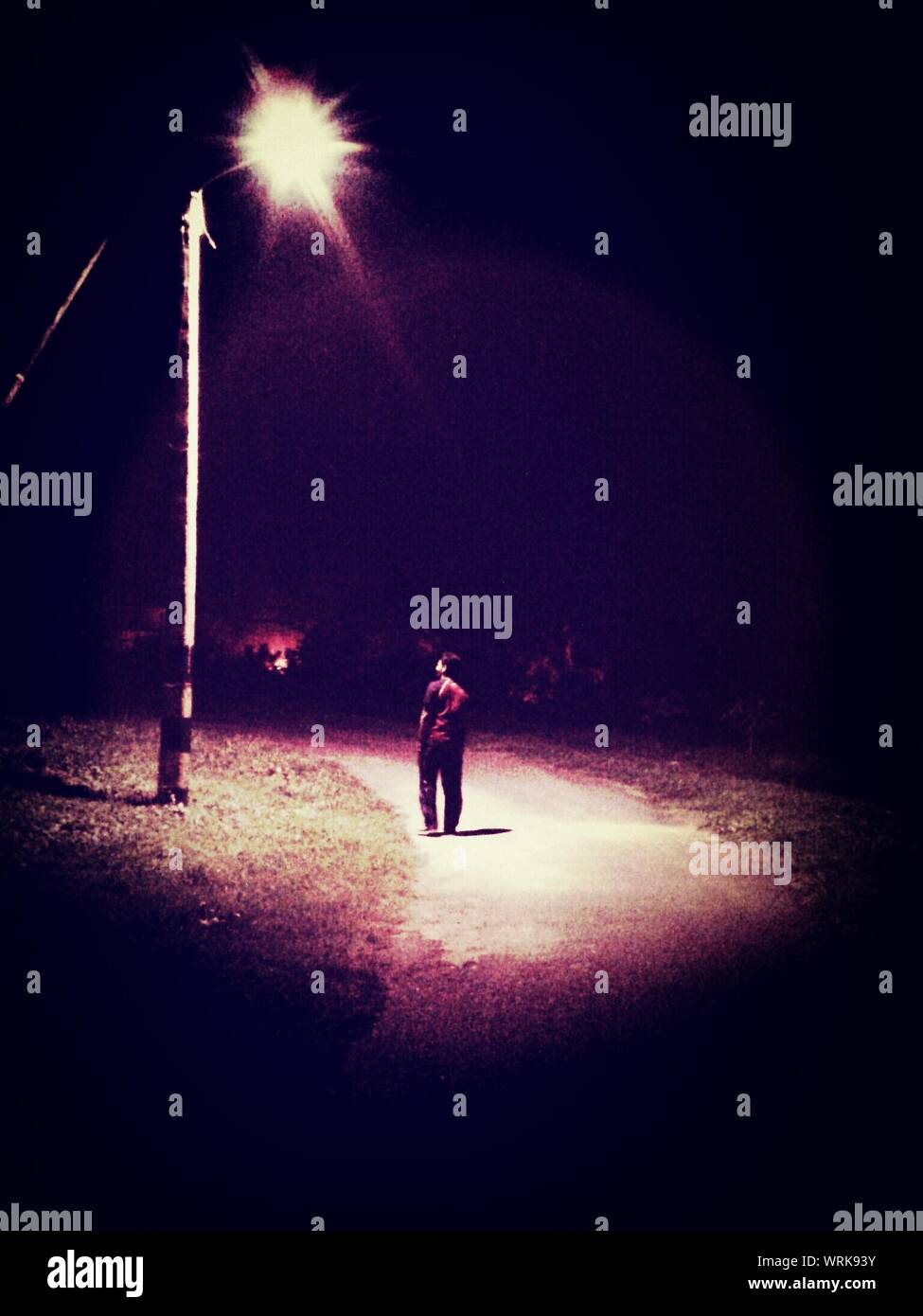 Man Under Street Light High Resolution Stock Photography and Images - Alamy