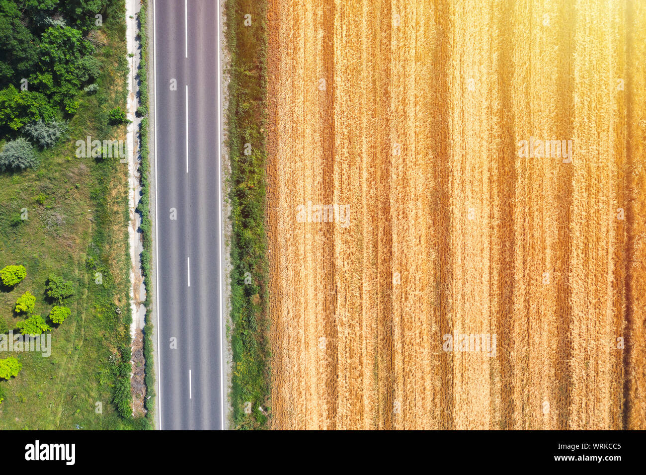 Farm land aerial view from above near country road, drone view ...