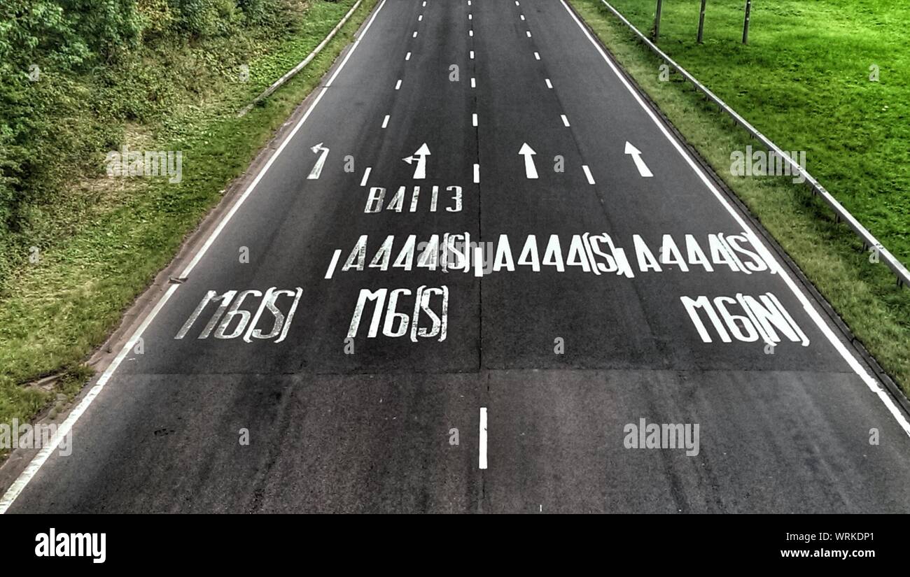 Directional road markings hi-res stock photography and images - Alamy
