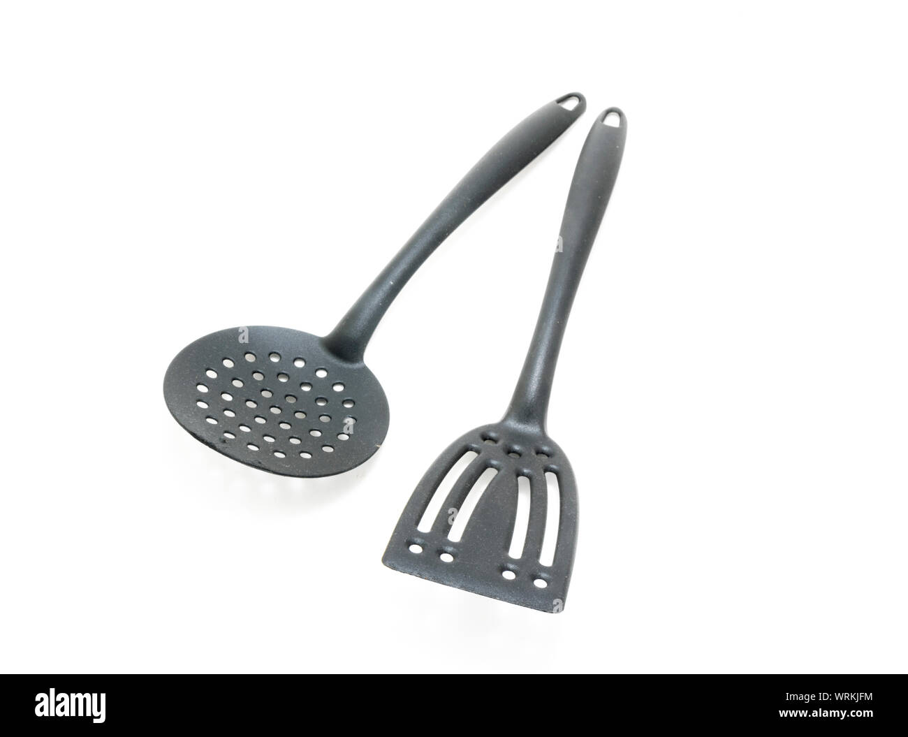 Black, plastic kitchenware isolated on white background Stock Photo - Alamy
