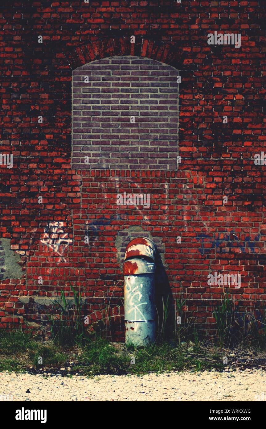 Brick wall pipe hi-res stock photography and images - Alamy