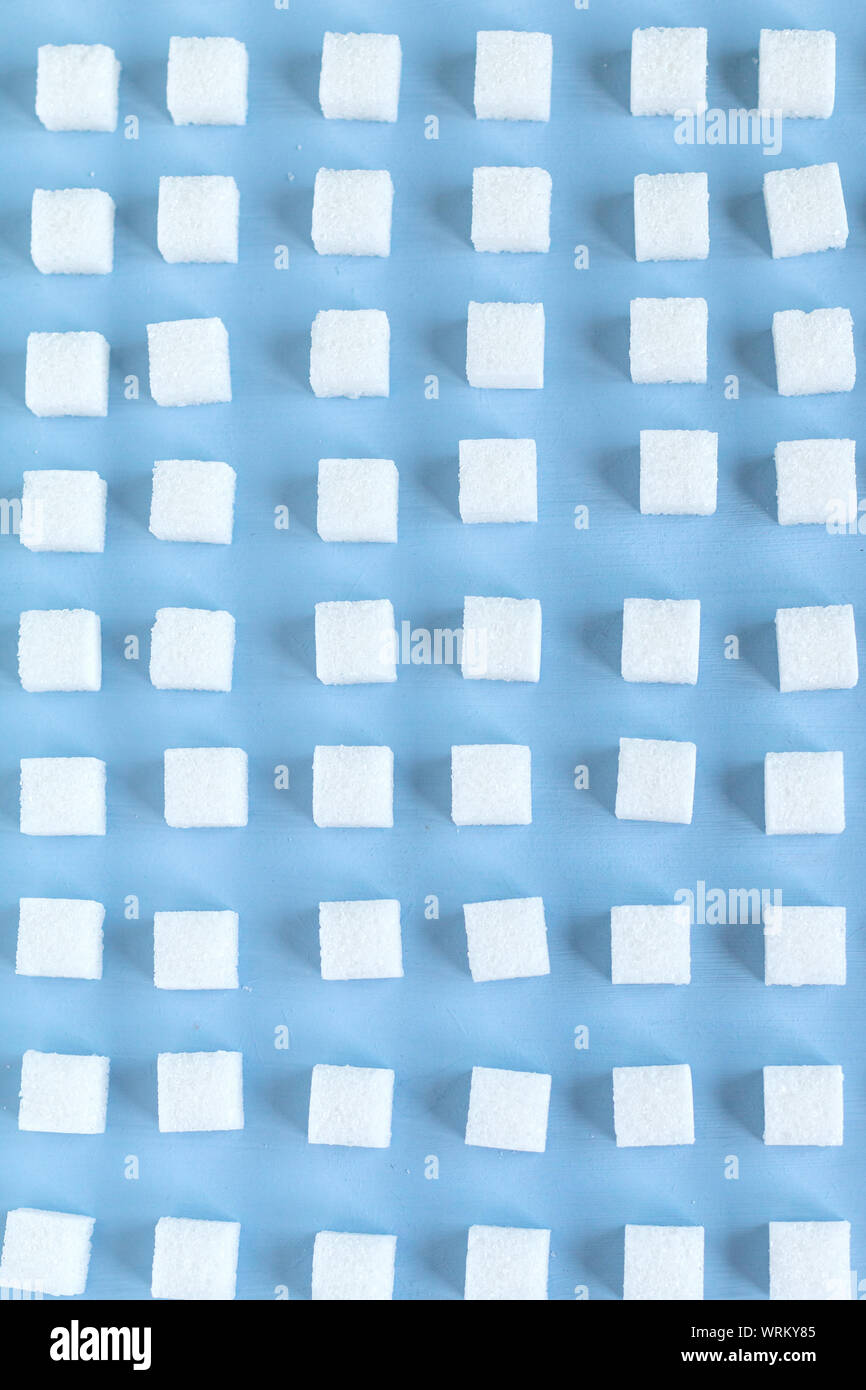 Repeating pattern with sugar cubes, blue background, wallpaper ...