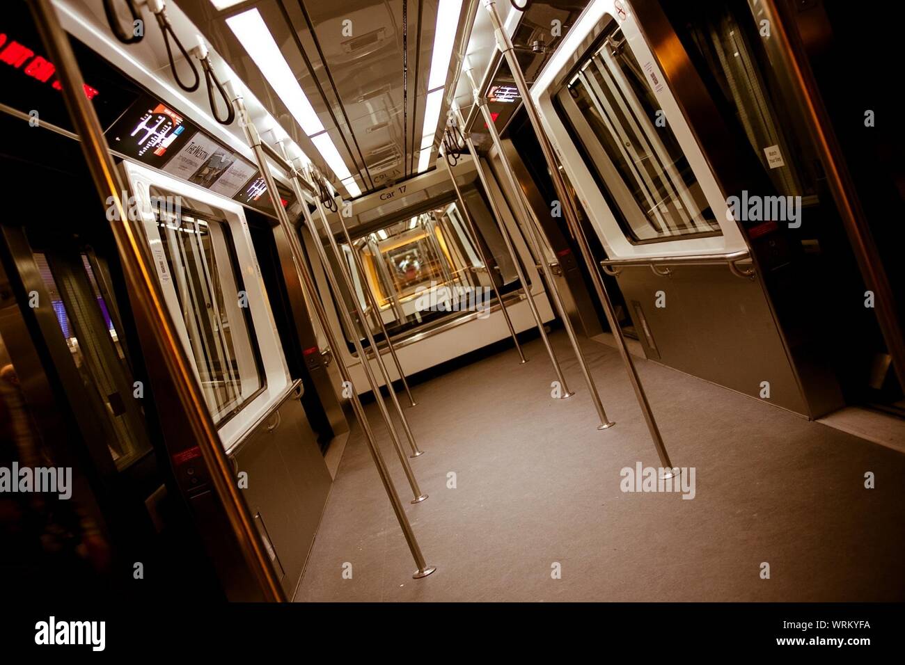 Interior Of Empty Illuminated Train Stock Photo - Alamy
