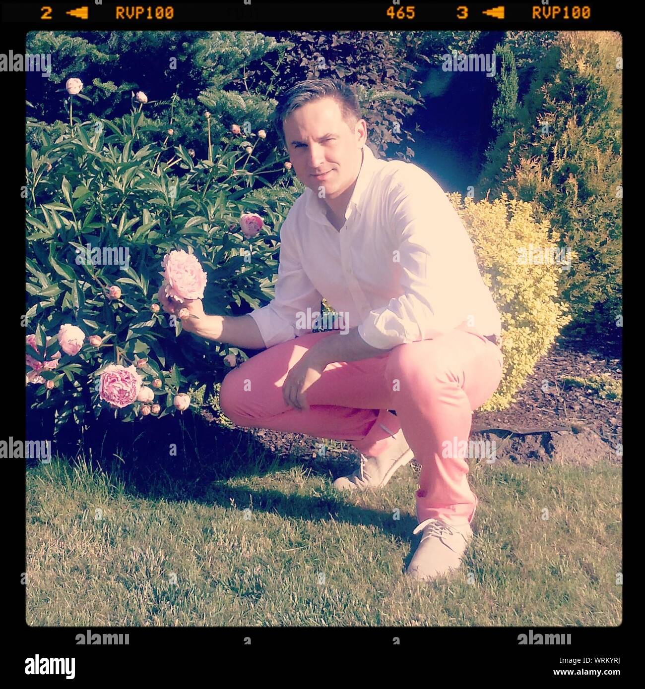 Adult squatting hi-res stock photography and images - Alamy