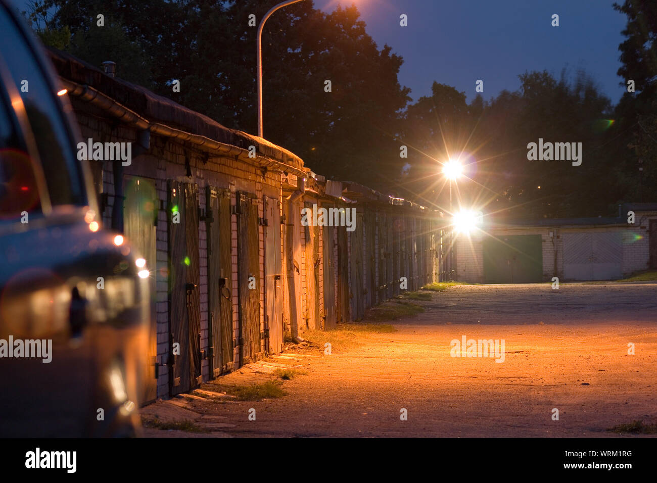 Garages at night Stock Photo - Alamy