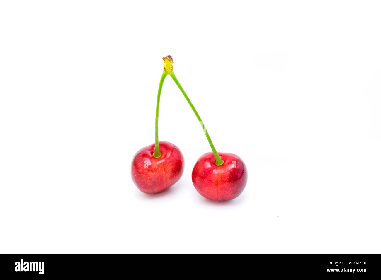 Beautiful fresh red cherries isolated on white background Stock Photo ...