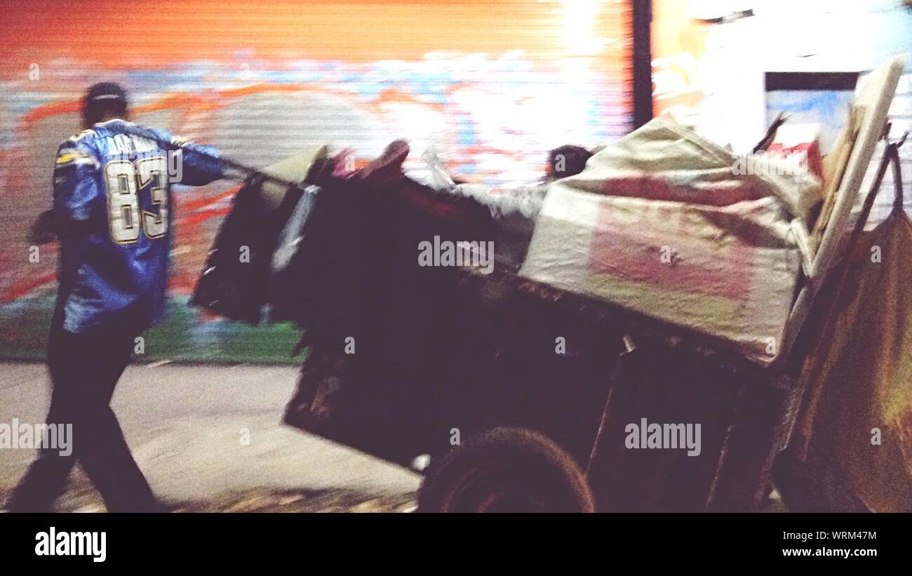 Man Pulling Cart Stock Photos & Man Pulling Cart Stock Images - Alamy