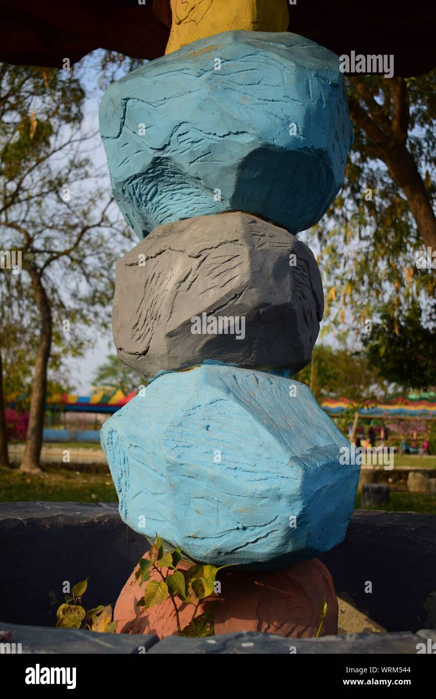 Big sized stone piled in a park Stock Photo - Alamy