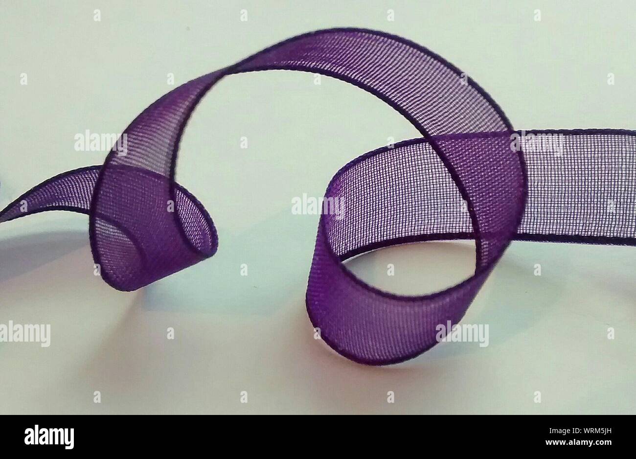 Purple ribbon hi-res stock photography and images - Alamy