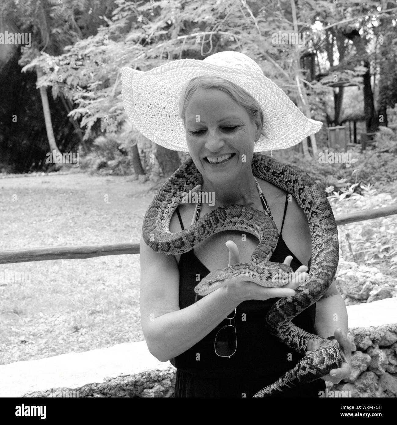 Woman snake hi-res stock photography and images - Alamy