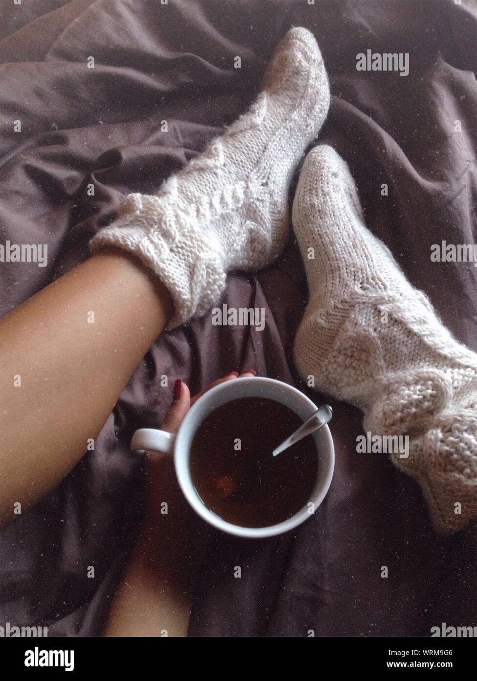 Woman spoon bed hi-res stock photography and images - Alamy