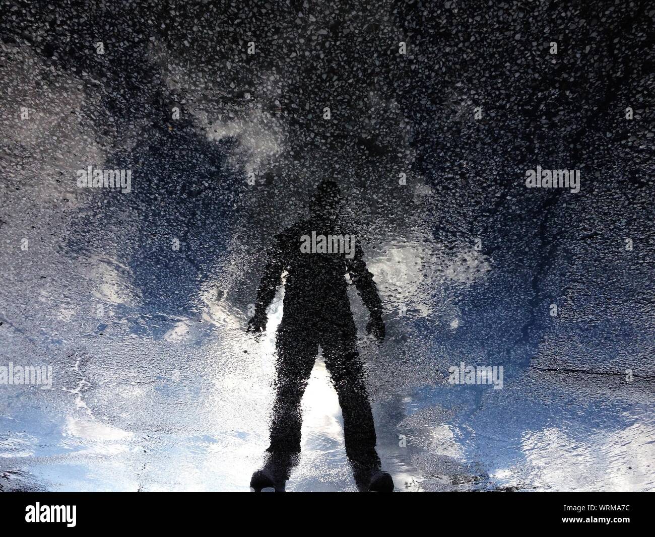 Man puddle hi-res stock photography and images - Alamy